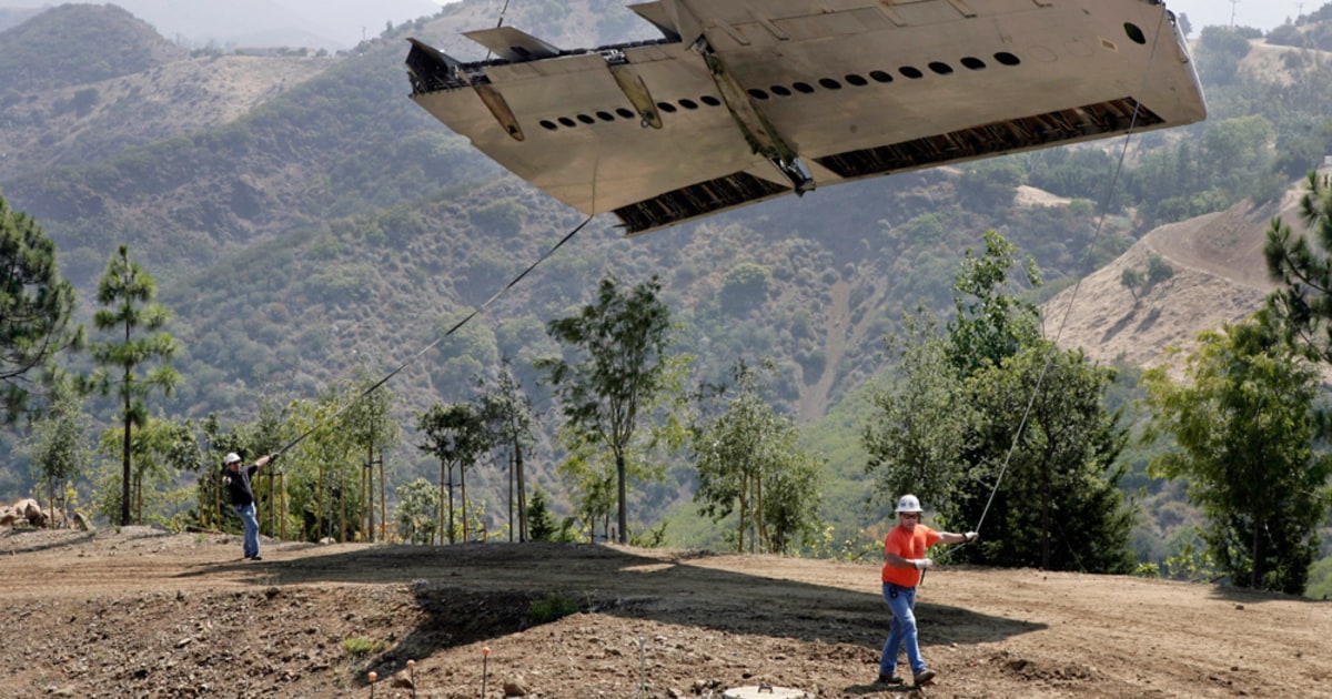 Woman builds house from junked jumbo jet