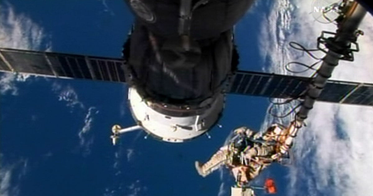 Phew! Spacewalkers remove explosive bolt