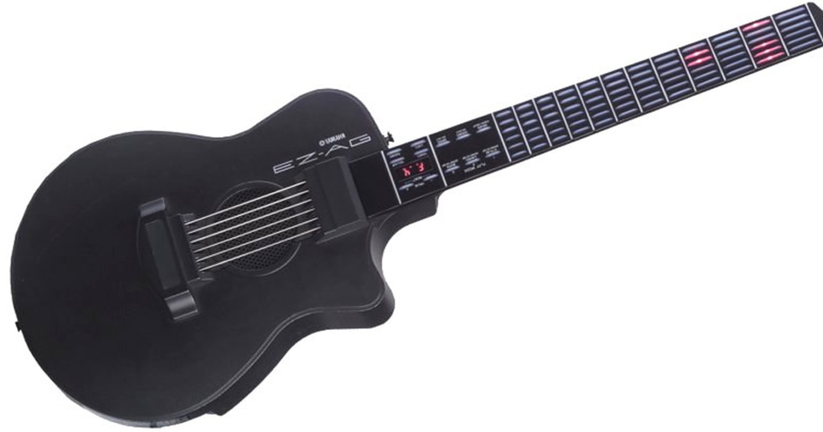 LED frets + automatic strings = guitar fun