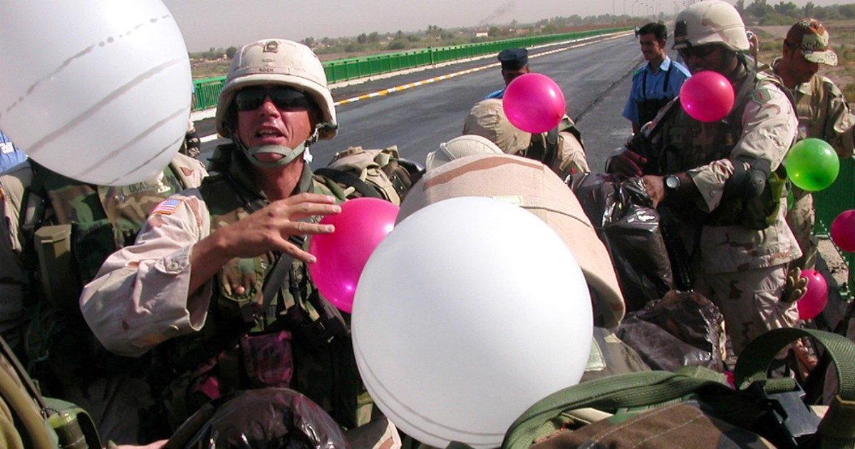 Cueing the balloons in Saddam’s hometown