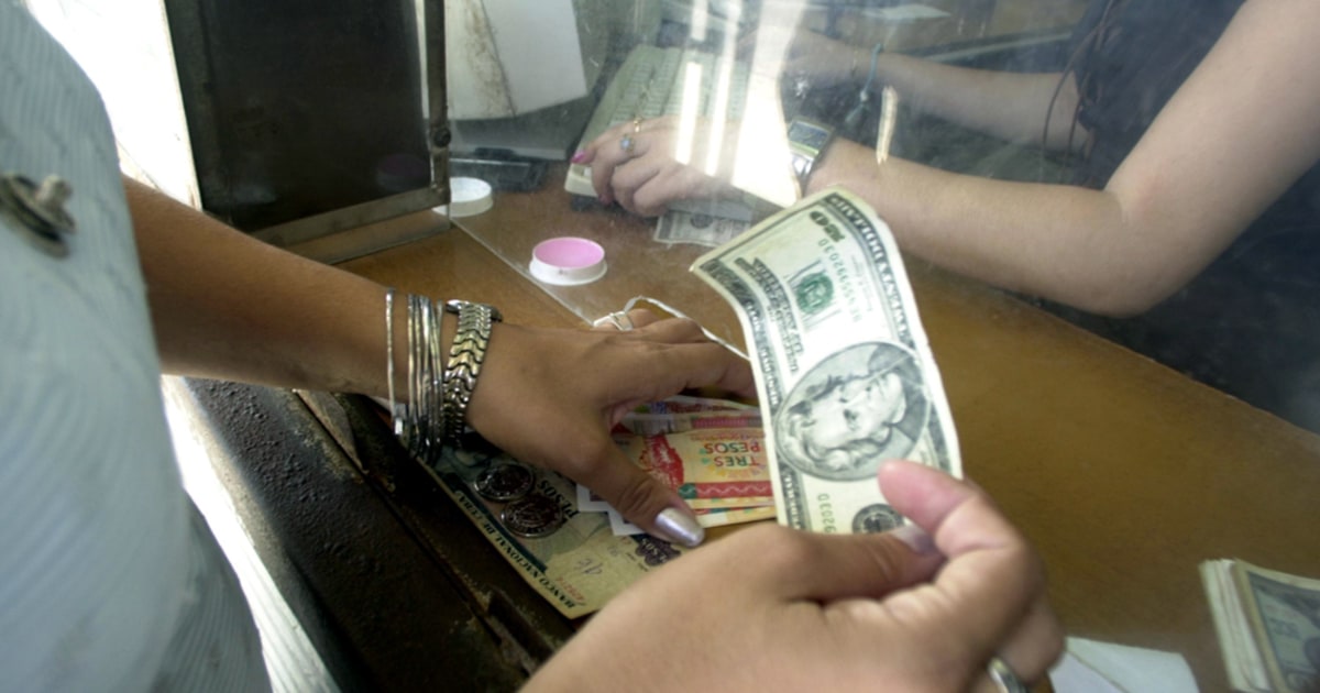 Cubans leery over dollar dumping