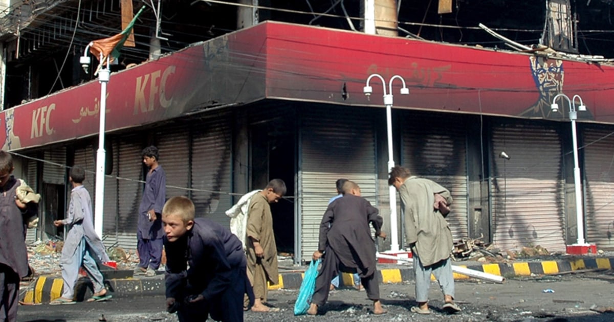 At least 11 killed in Pakistan attack, riot