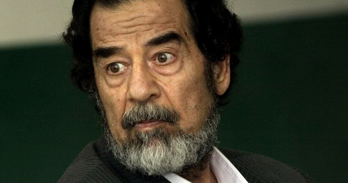 Defense team says Saddam assaulted in court
