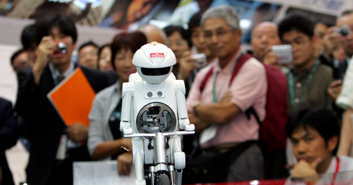 Japanese robot goes bike-riding