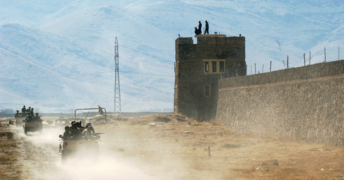 Troops await orders in Afghan prison riot