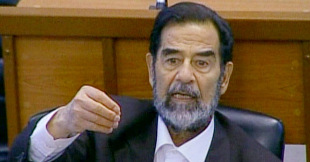 Saddam says he was forced into courtroom