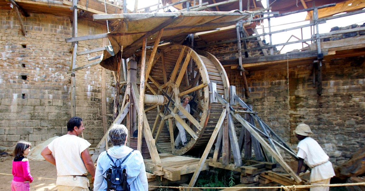 Craftsmen build a medieval-style castle