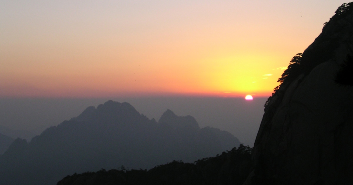 Sunset and sunrise atop China's peaks