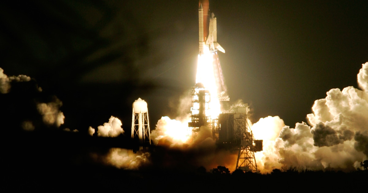 Shuttle launch lights up the night