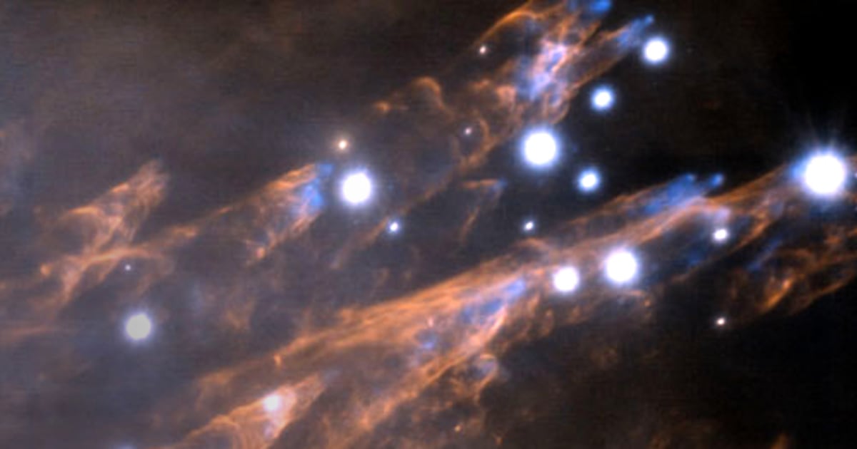 Cosmic bullets pierce space cloud