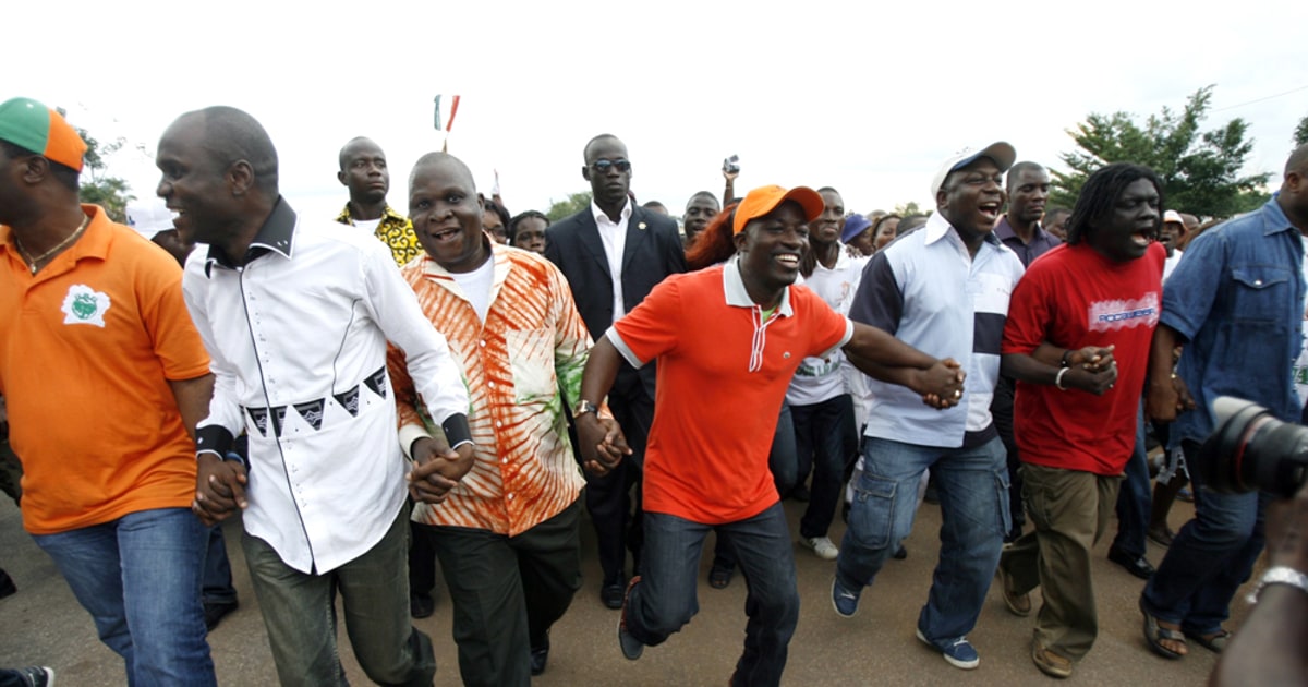 Ivory Coast leaders burn weapons of war
