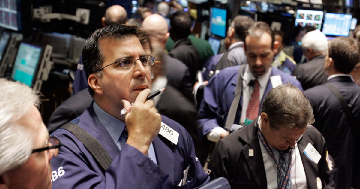 Wall Street plunges, rallies, ends day mixed