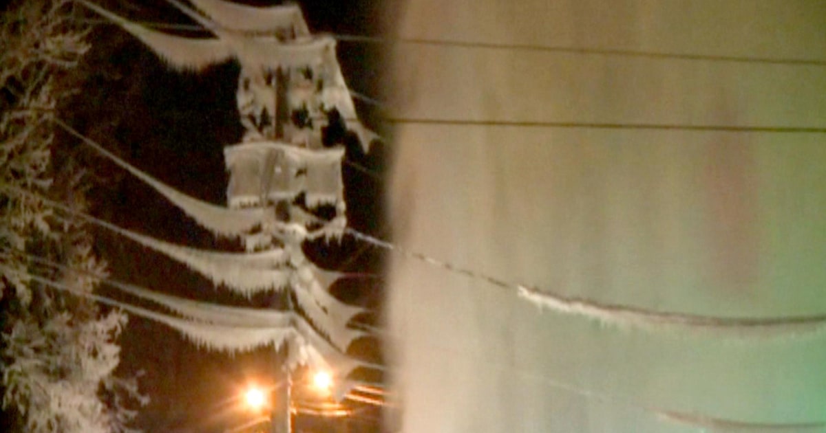 Power Lines Covered in Ice After Water Main Breaks