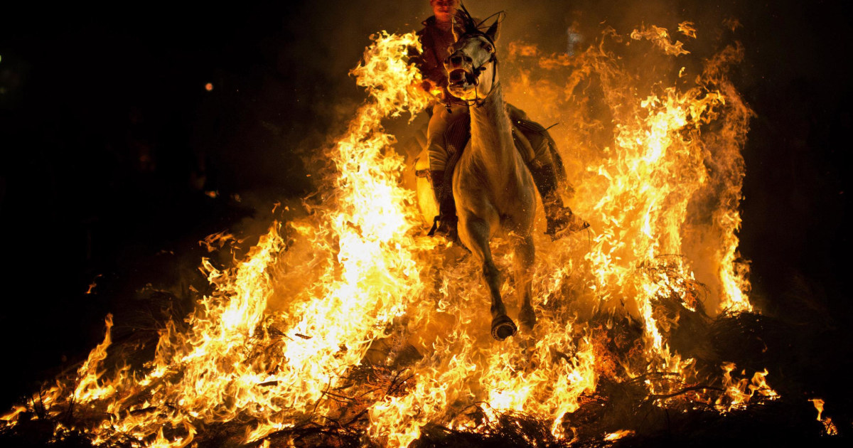 Blazing Saddles! Horses Ride Through Bonfire