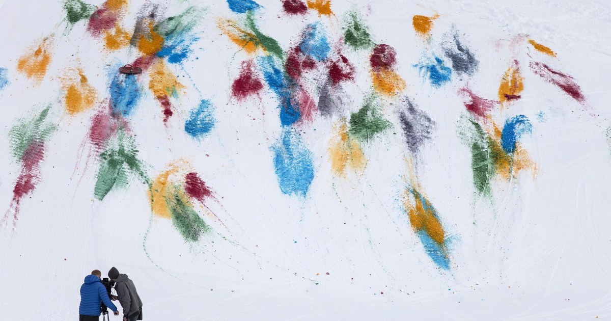 Mountain Canvas: Artist Paints in Snow