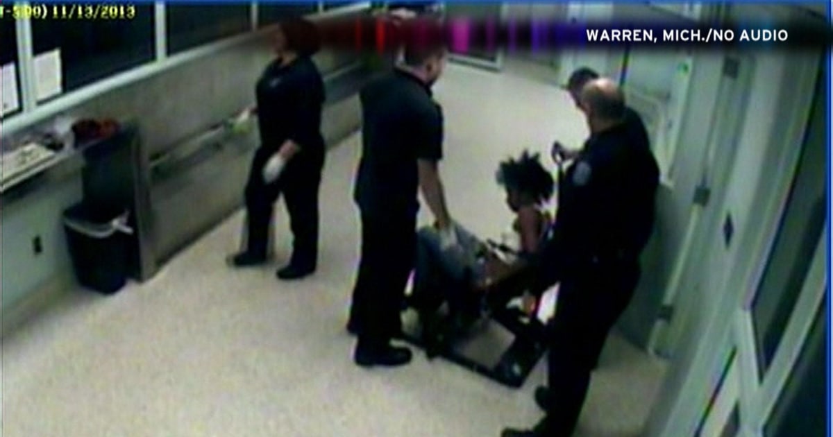 Watch: Cop Cuts Woman's Hair as She Protests