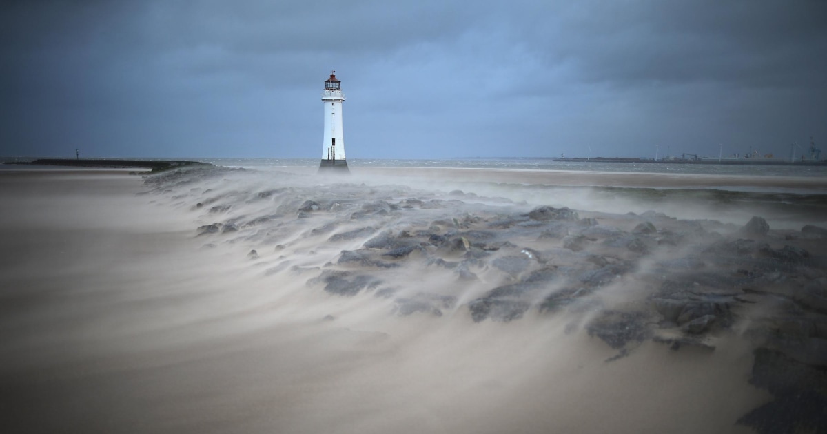 Buried in the Sand: Storm Whips Across U.K. Shore