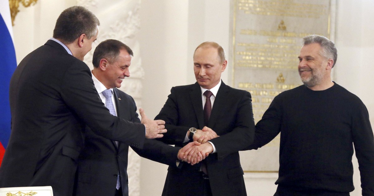 Show of Hands: Putin Seals the Deal with Crimea
