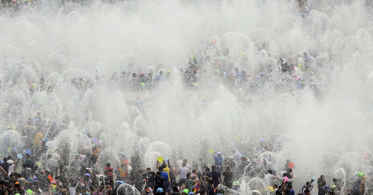 Water Splashing Festival Soaks Asia for New Year