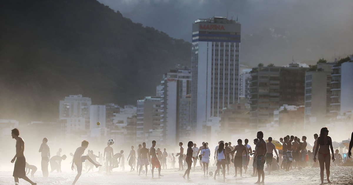 Kicking Back: Beachgoers Relax in Rio
