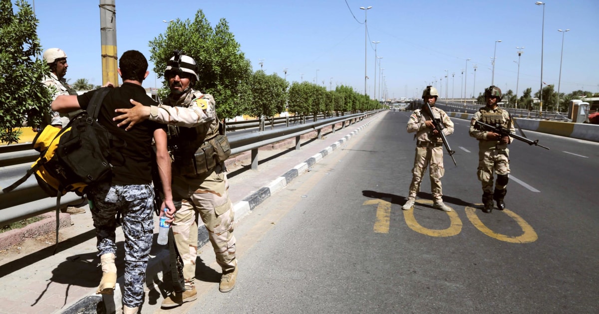 Dozens of Detainees Killed at Police Station, Iraq Officials Say