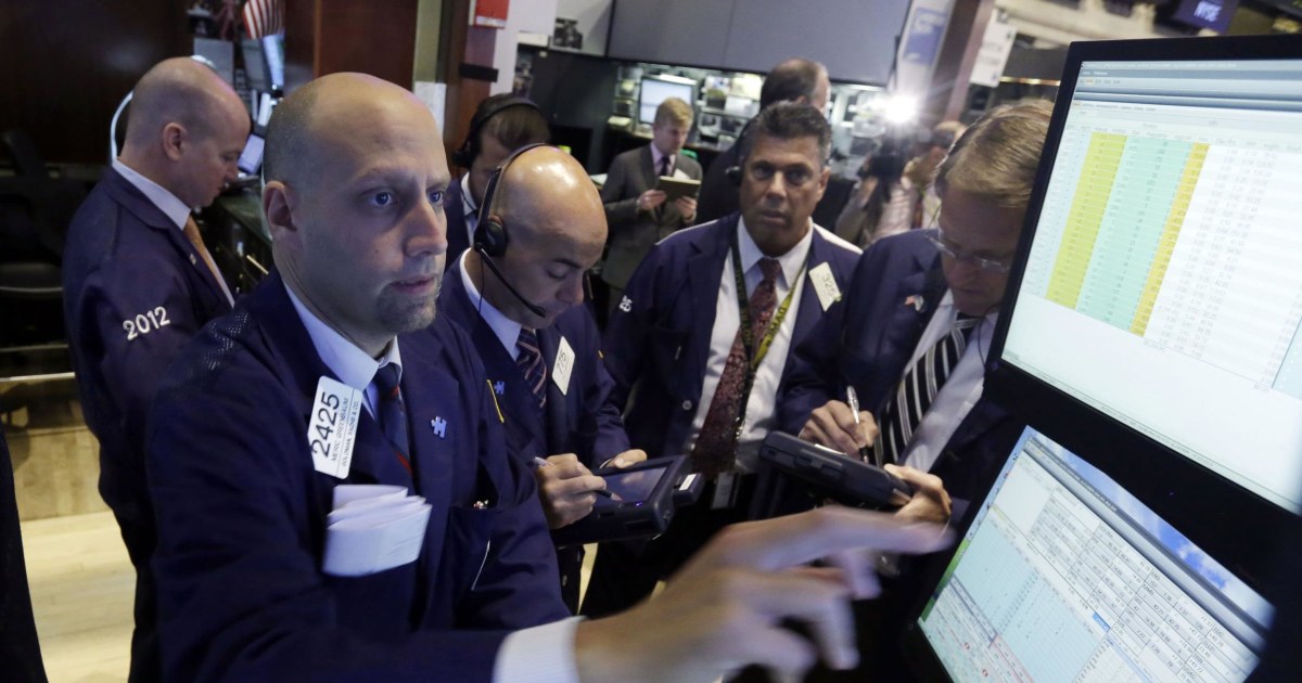 Dow Closes at Record High, Just Short of 17,000-Point Milestone