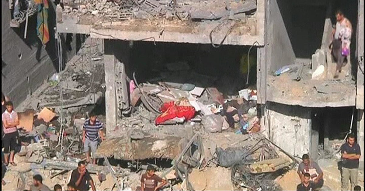 Palestinians Search for Survivors After Air Strikes in Gaza