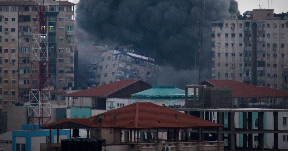 Photo Captures Gaza Tower Collapsing After Strike