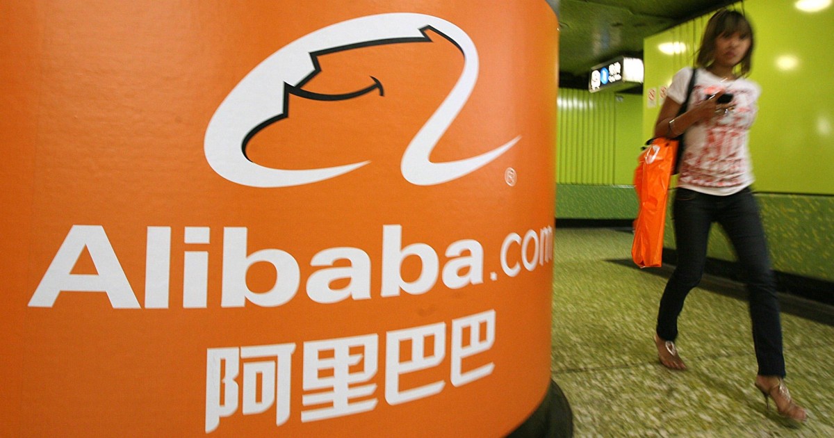 Alibaba Singles' Day tops $30 billion, but growth rate plunges