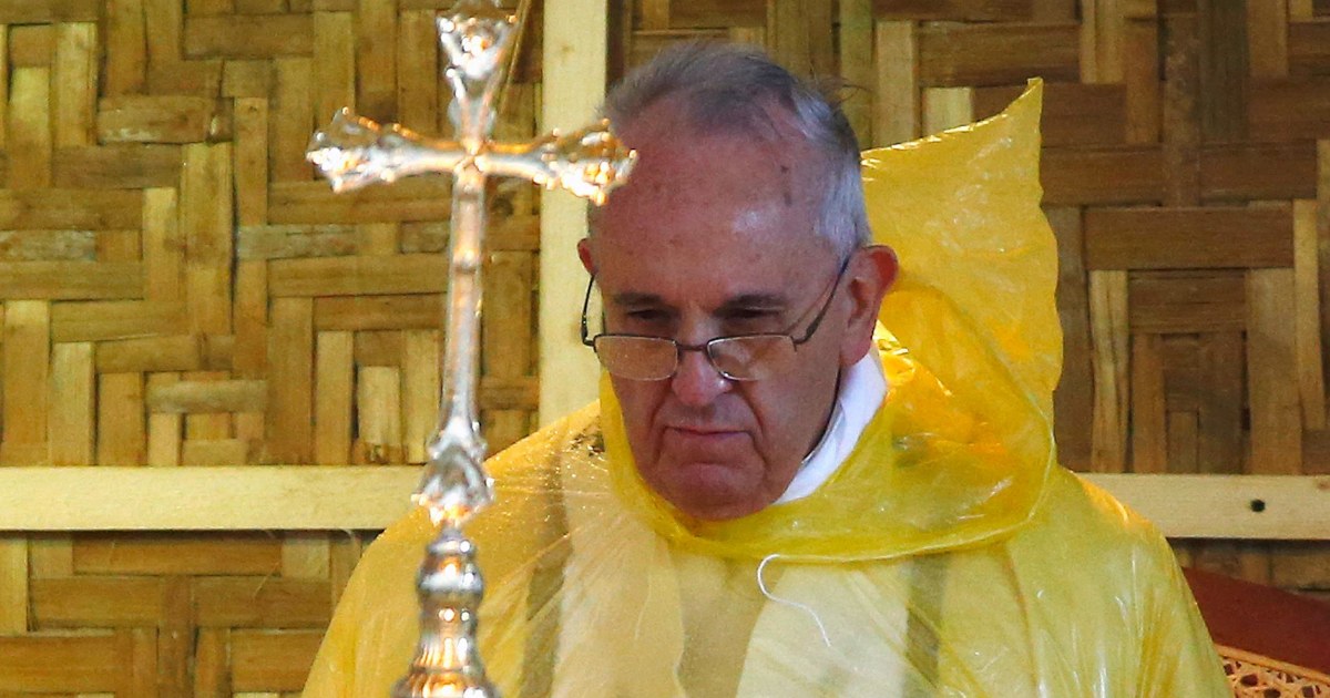 'Truly Saddened': Rain-Soaked Pope Comforts Typhoon Haiyan Survivors