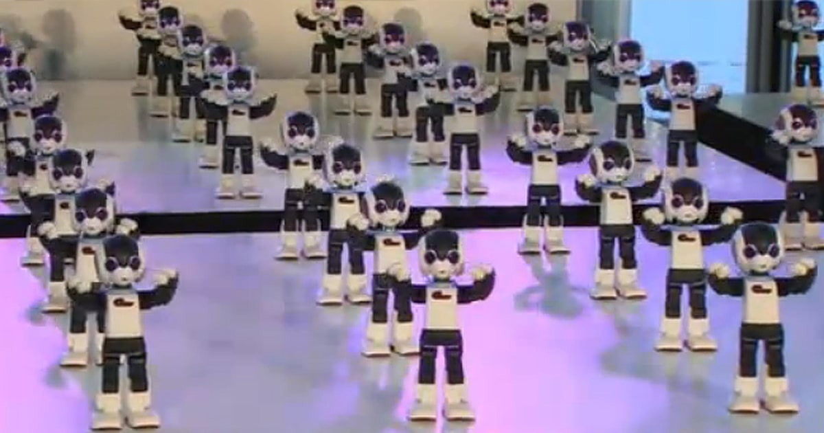 Robots Host News Conference as Mini Humanoids Strut Their Stuff