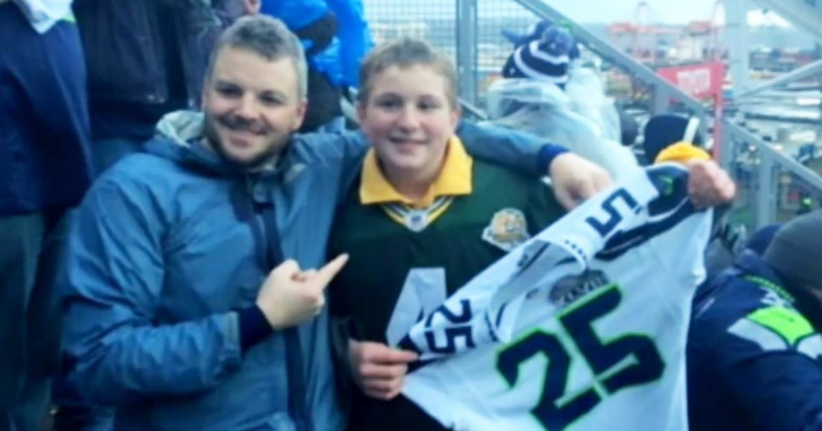 Seahawks Fan Gives Shirt Off His Back