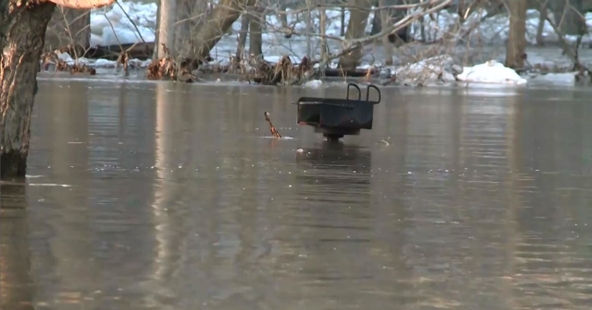 Residents Brace for Flooding as Spring Comes to Frozen River