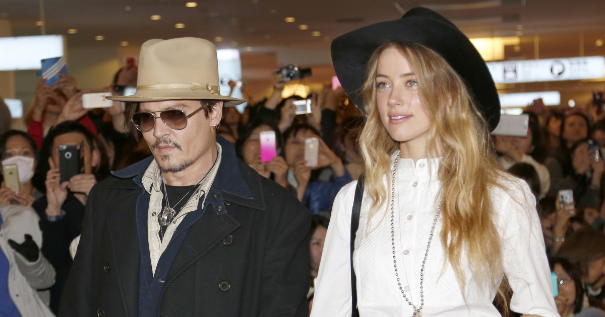 Johnny Depp's Wife Charged With Illegally Bringing Dogs Pistol and Boo ...