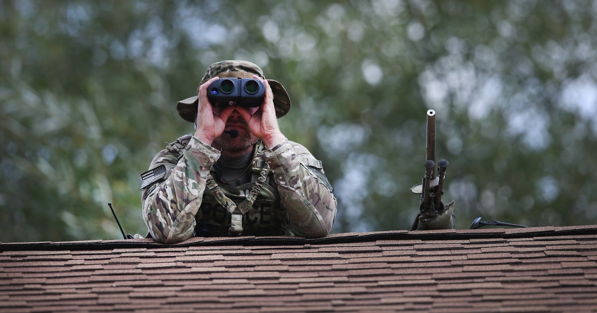 Massive Manhunt Targets Suspects in Illinois Cop Killing