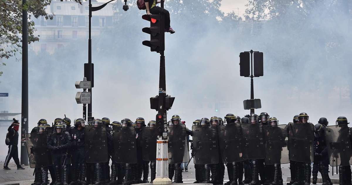 Thursday in Pictures: Paris Protests and Tank Anniversary