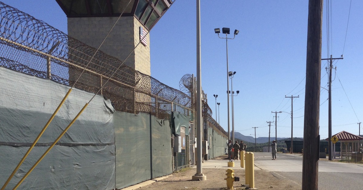 Obama Signs Defense Policy Bill, Objects on Guantanamo