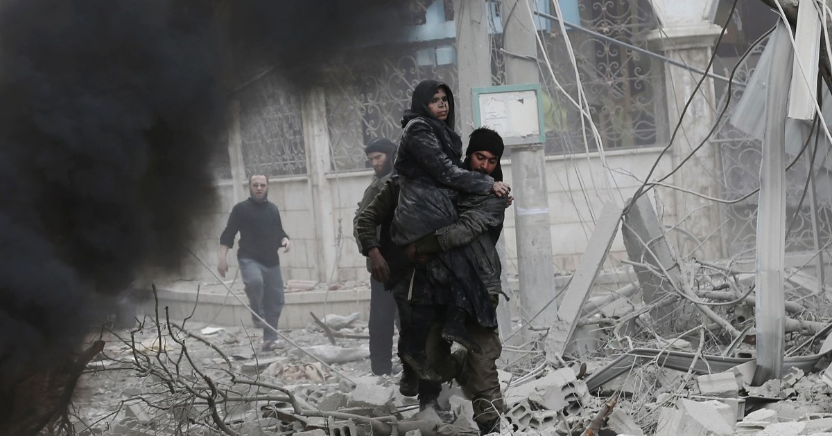 Syrians pulled from rubble of besieged city outside Damascus