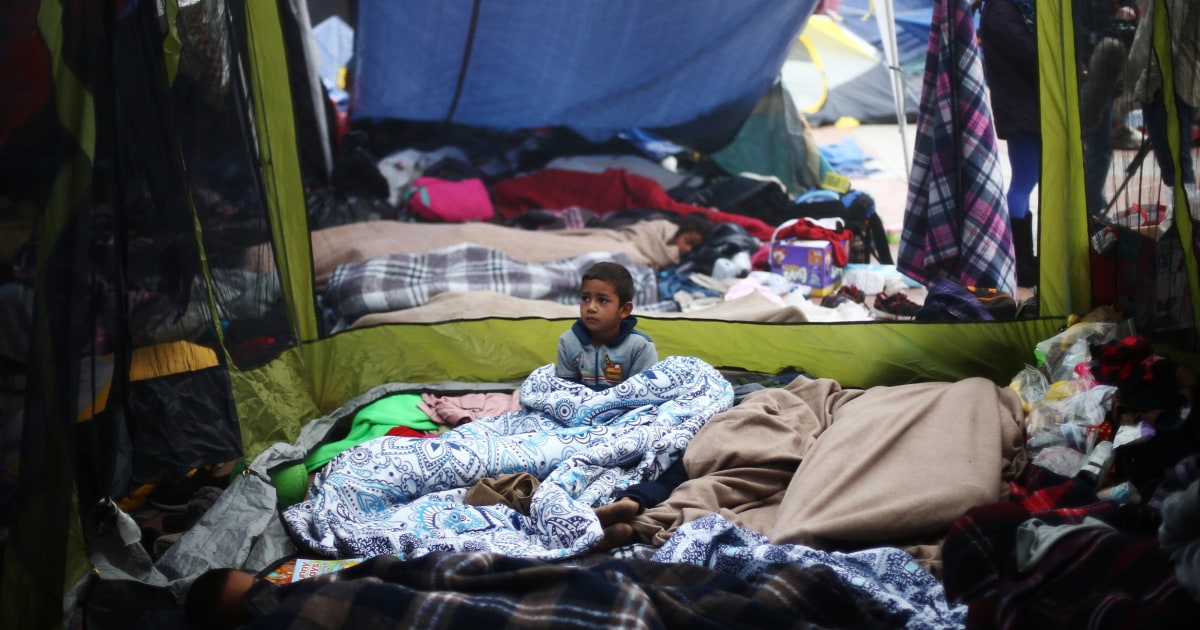 Over 50 caravan migrants seeking asylum allowed into U.S., organizers say