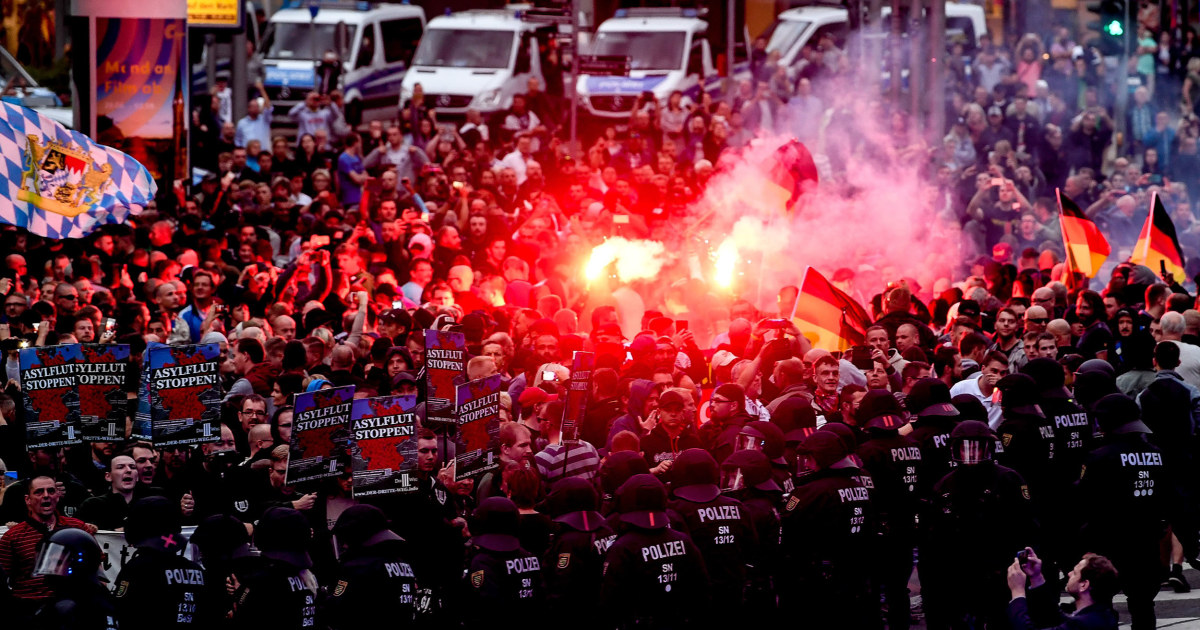 German neo-Nazi protesters clash with counter-demonstrators, injuring 6
