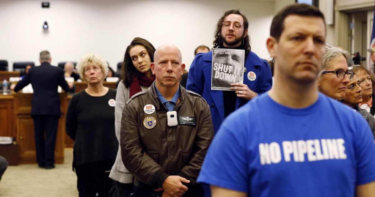 Protesters turn their back as disputed Virginia gas project vote ...