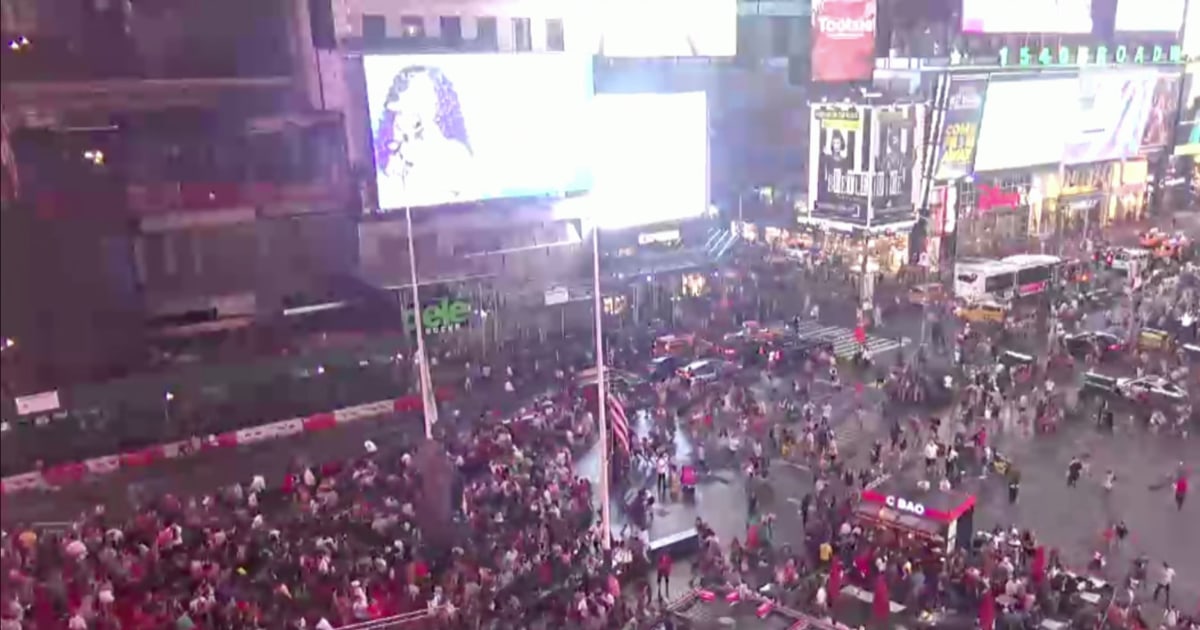 Backfires and falling sign spark panic in Times Square, Utah after ...