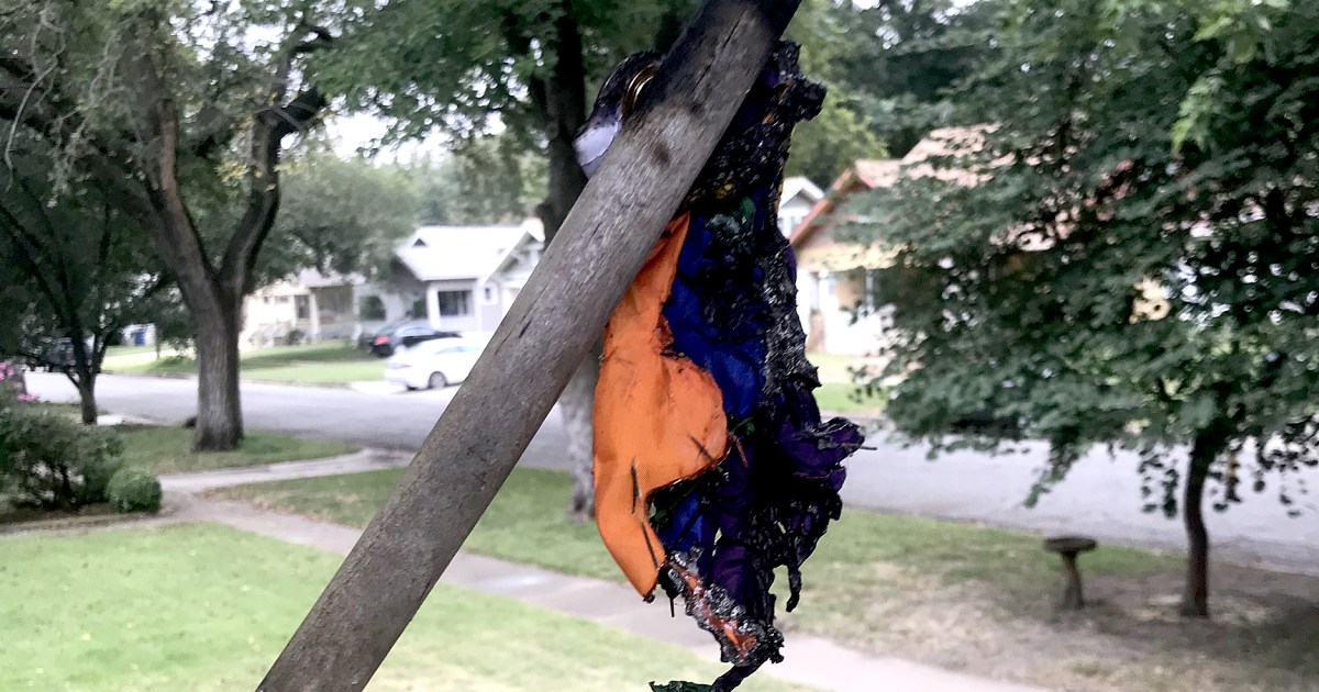 Kansas family's pride flag burned down in suspected hate crime