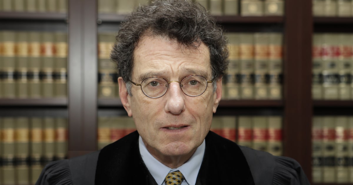 Judge in opioid litigation won't remove himself from case
