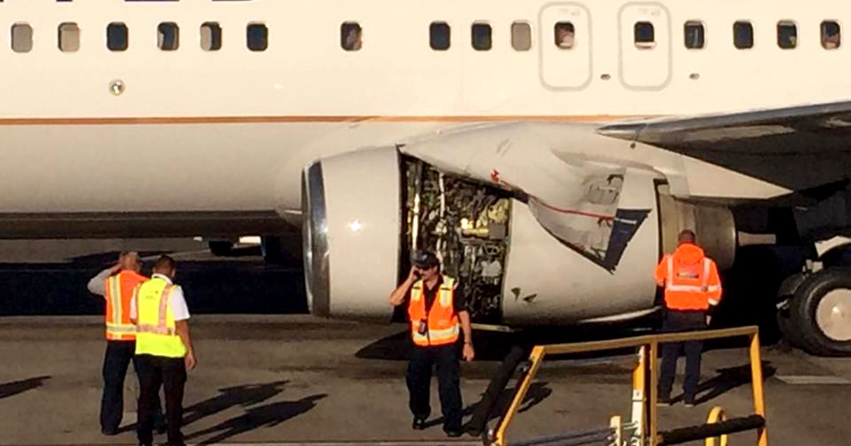 Midair video shows United plane's engine exposed before emergency landing