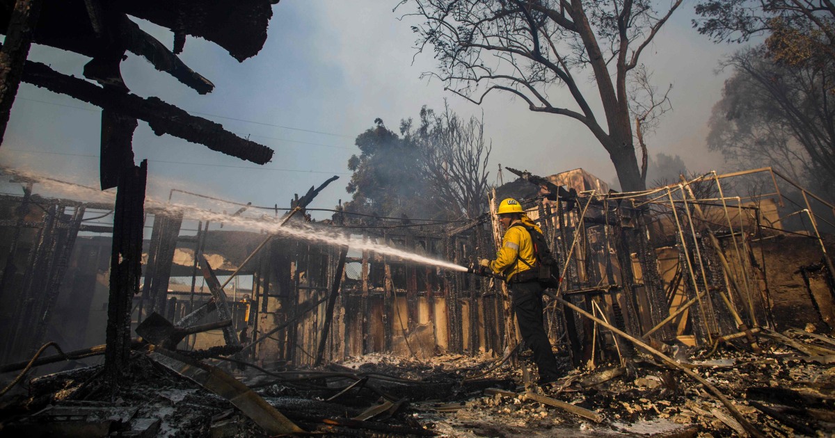 Flames engulf Los Angeles hillside, threaten the famed Getty Center museum