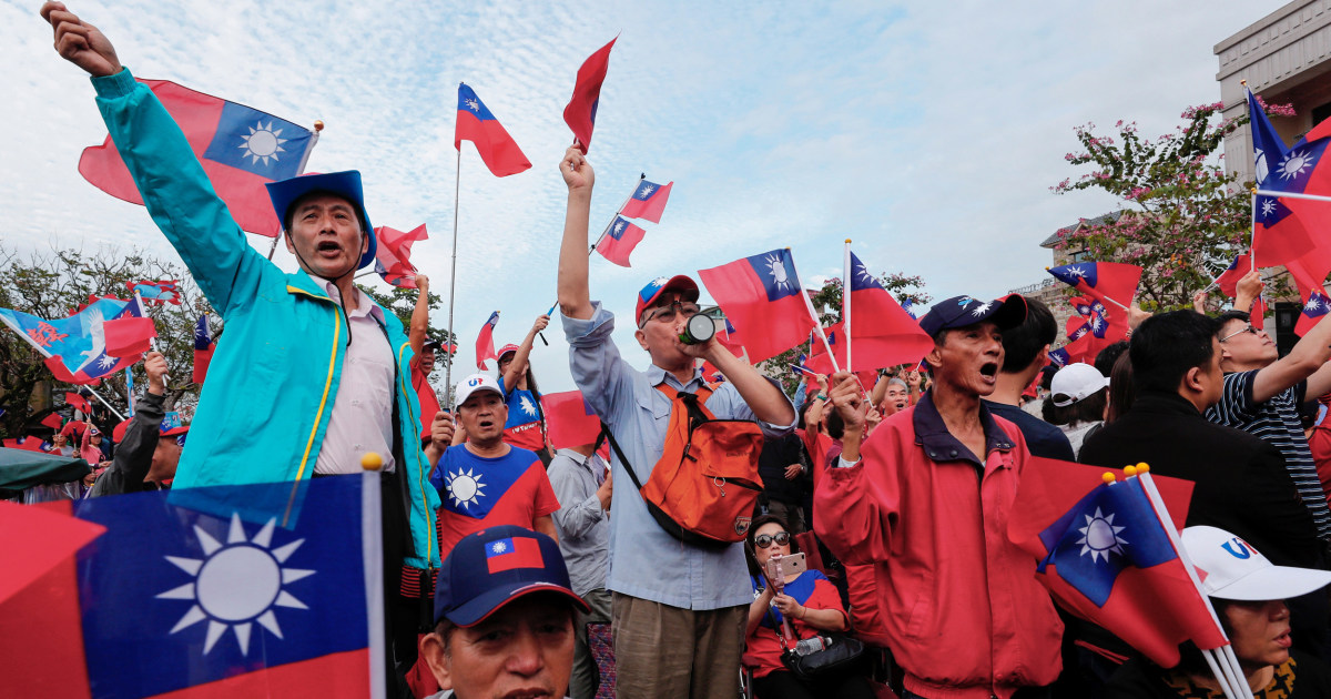 Expats travel back to vote in Taiwan's heated presidential election
