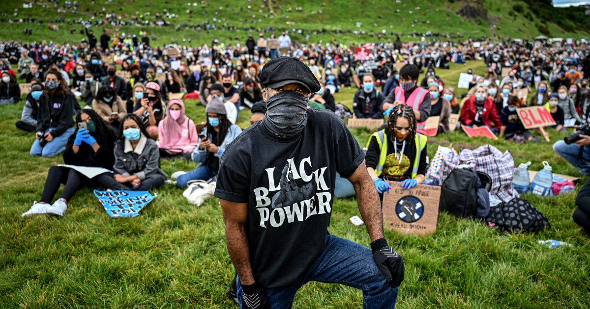 Mitt Romney marches with protesters in Washington, D.C.