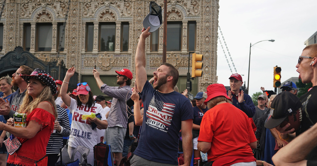 Outside Trump's Tulsa rally site, few face masks and no social distancing