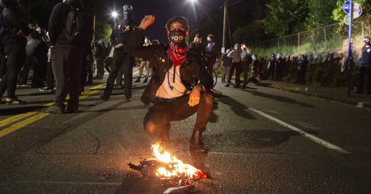 Protesters in Portland, Oregon, clash with police, federal officers ...